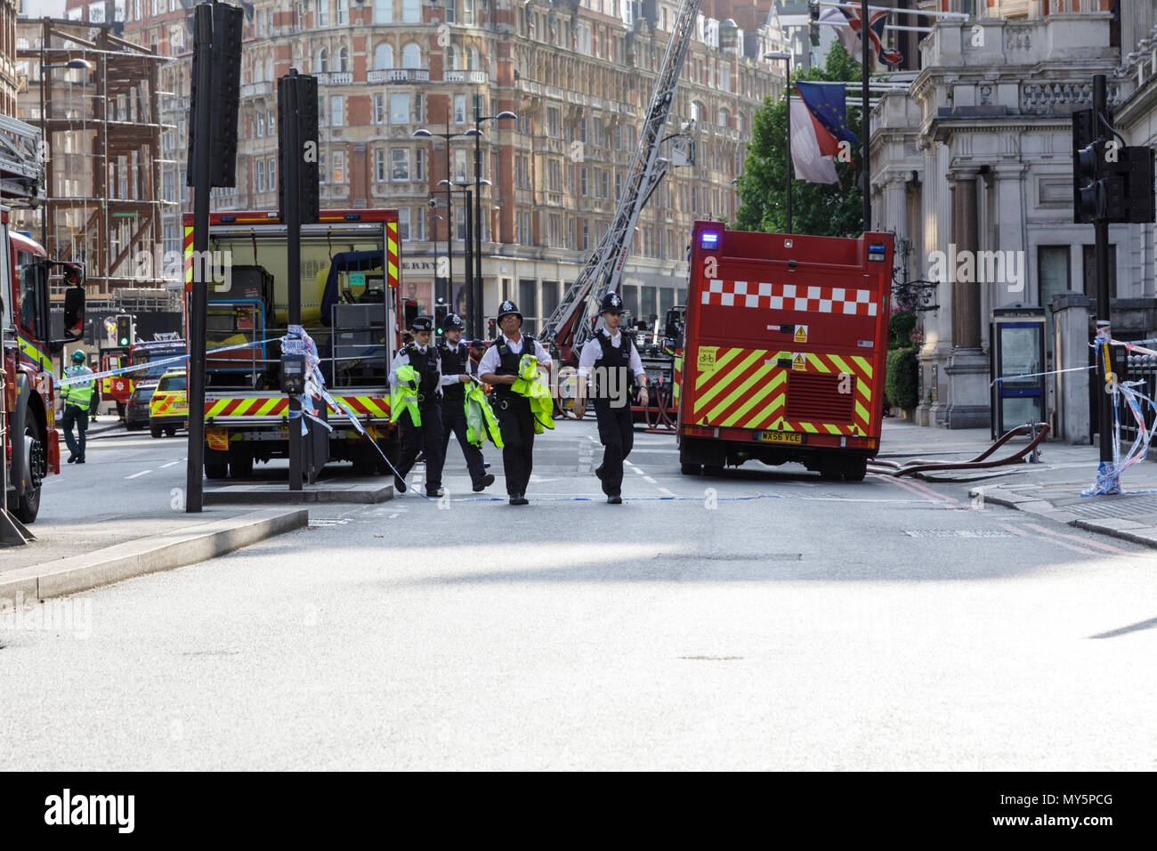 Knightsbridge, London, 6th June 2018. Firefighters, rescue services and ...