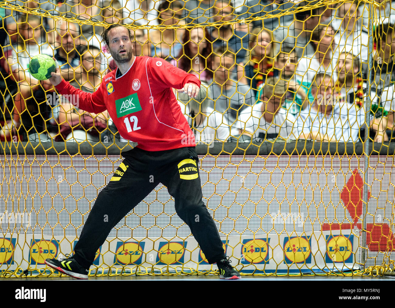 Goalkeeper throwing ball hi-res stock photography and images - Alamy