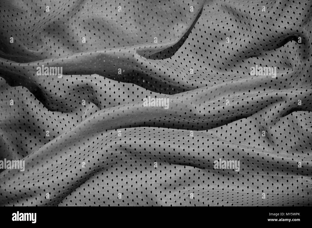 Grey sport clothing fabric texture background. Top view of grey cloth ...