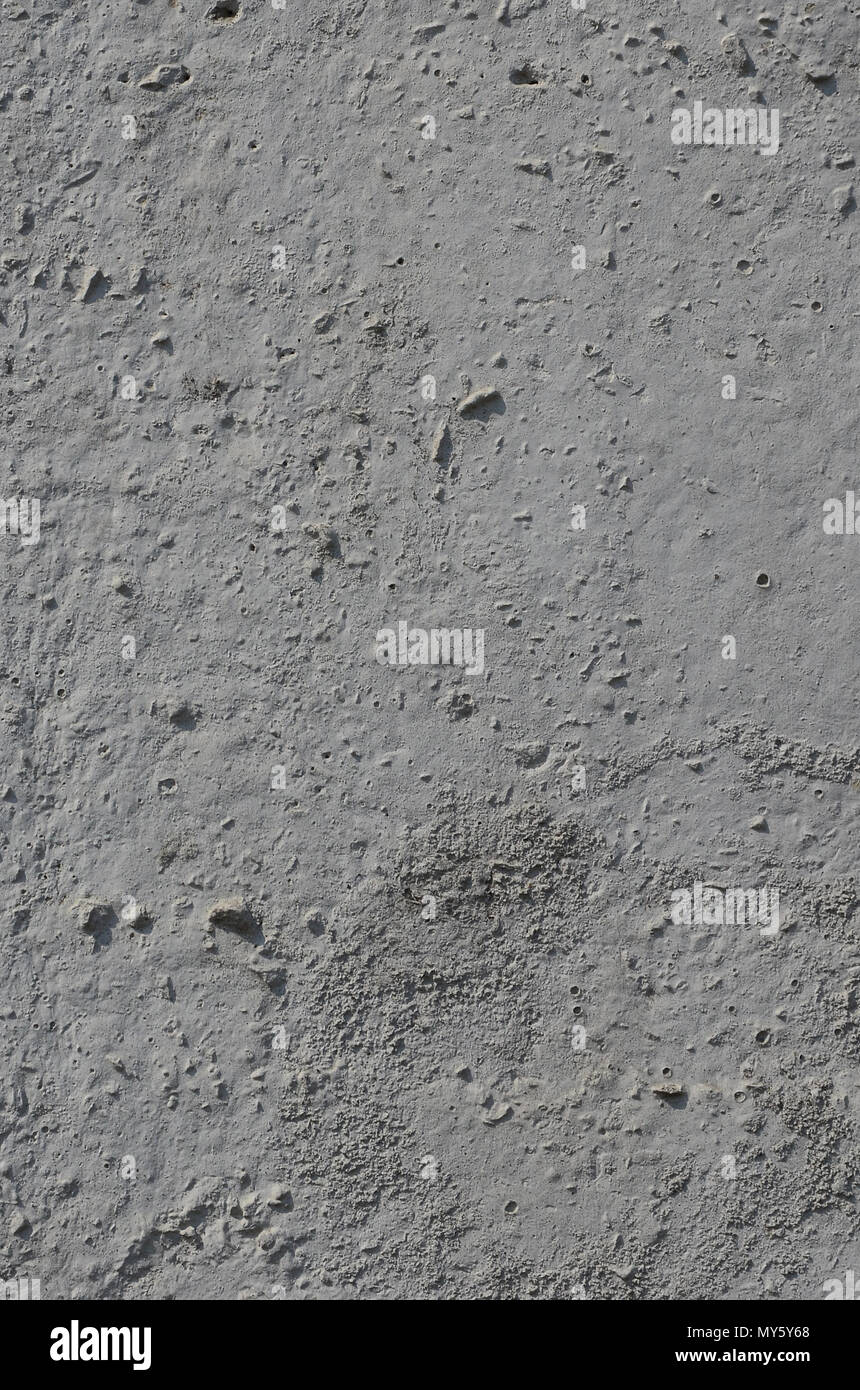 Texture of the old embossed concrete wall in gray color. Background ...