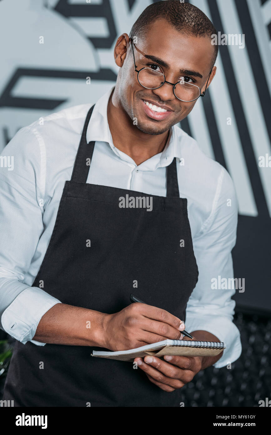 Handsome waiter looking camera hi-res stock photography and images - Alamy