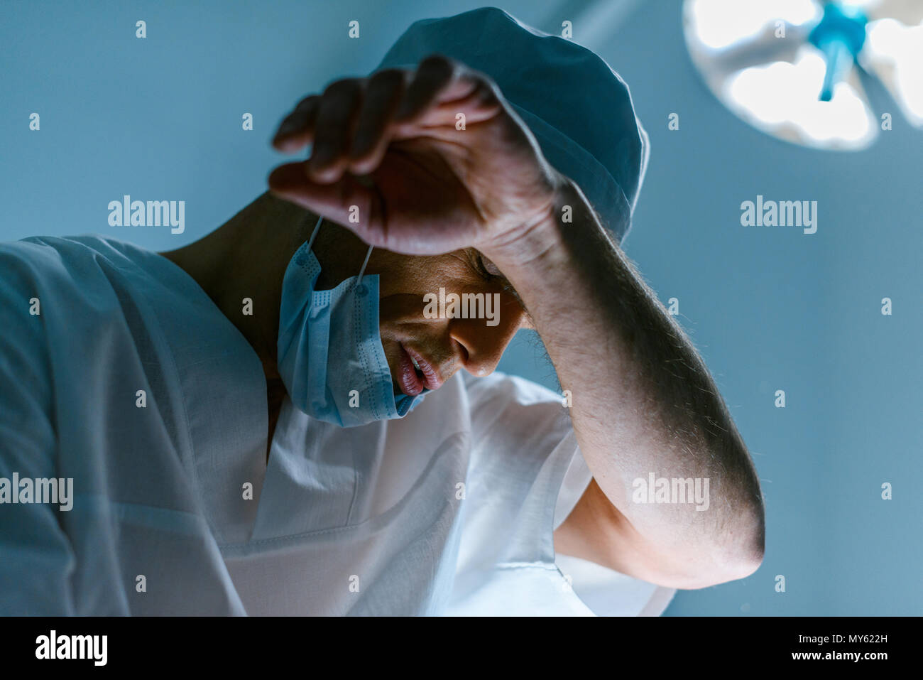 Tired doctor hi-res stock photography and images - Alamy
