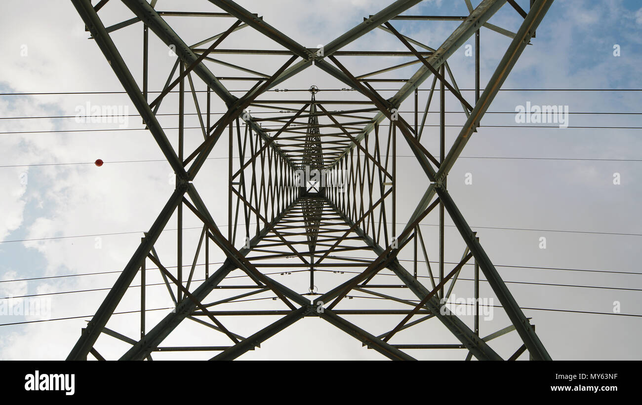 electric high voltage column with wires on the sky background Stock ...