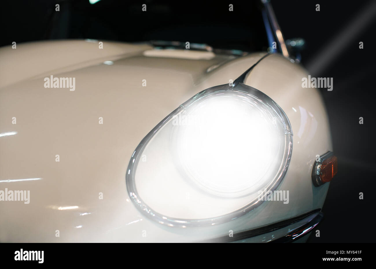 machine industry, white car headlight close-up Stock Photo - Alamy
