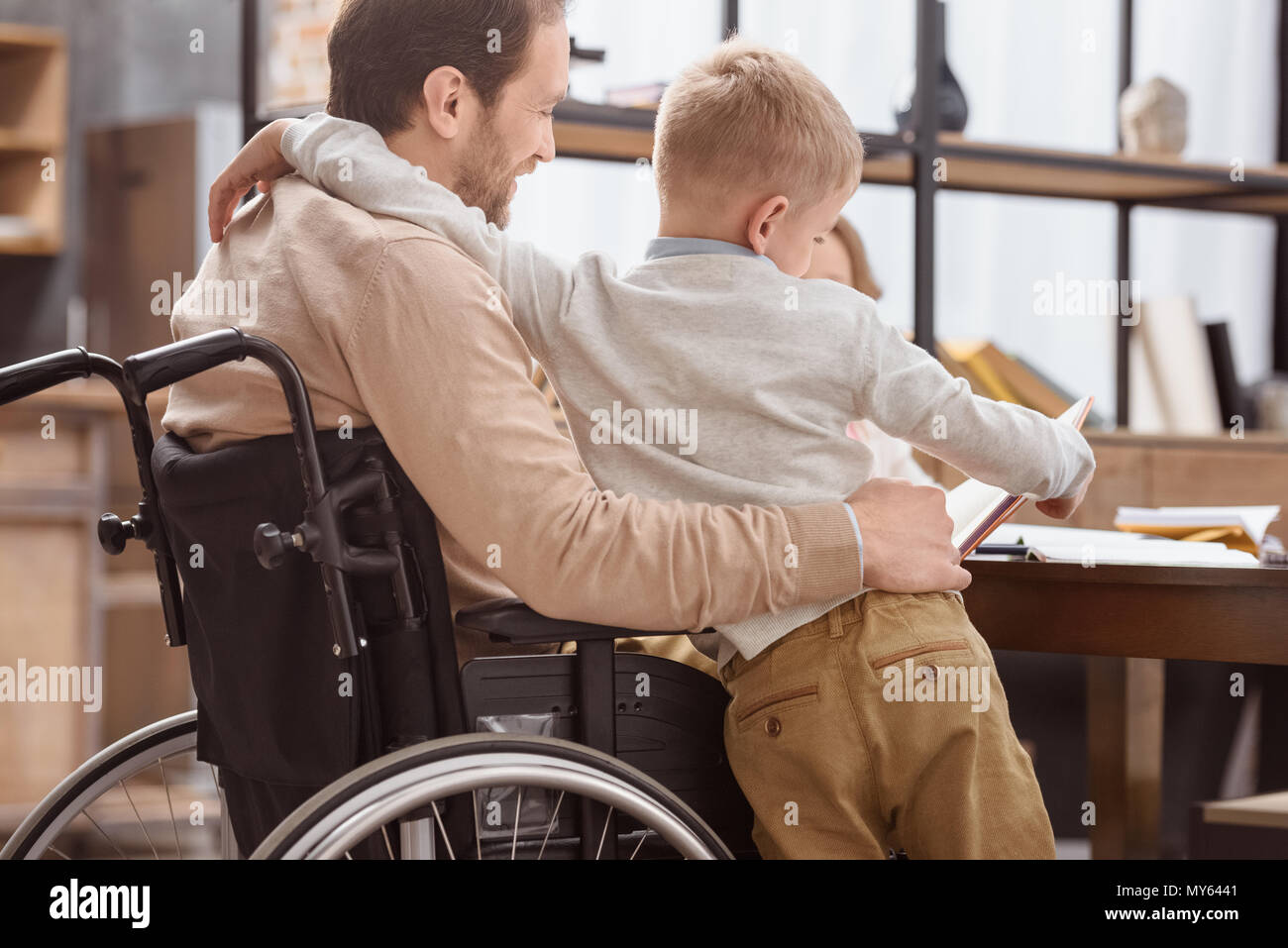 Girl hug handicapped boy hi-res stock photography and images - Alamy