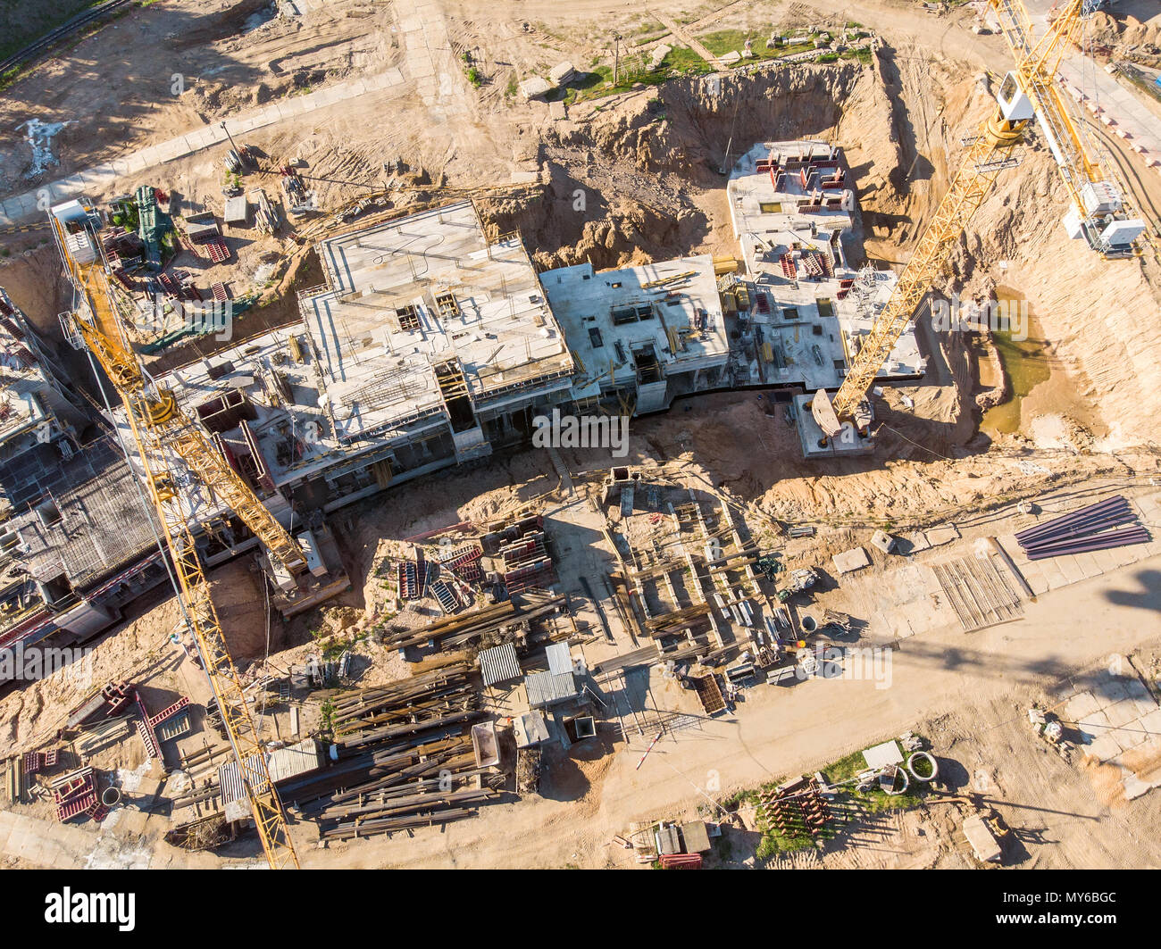 Building foundations and construction cranes hi-res stock photography ...