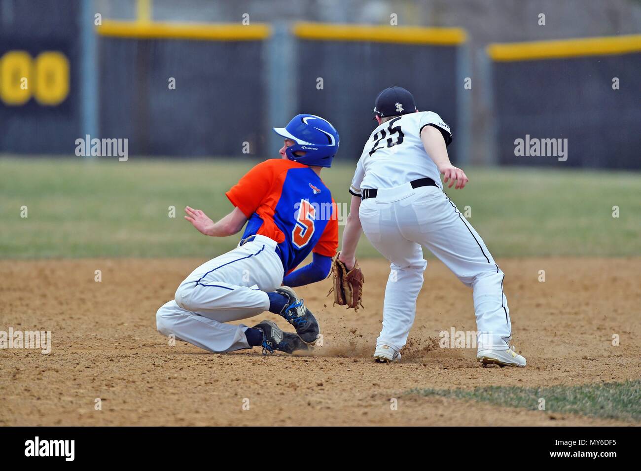 Second baseman Colin pivoting in an effort to apply a tag on an ...