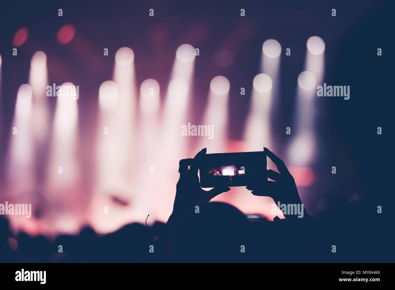 Close up of smart phone recording video during a live concert Stock ...