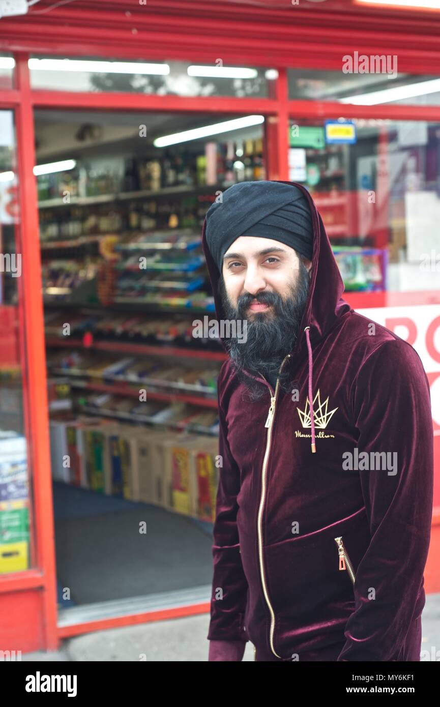 Asian shop keeper Stock Photo - Alamy
