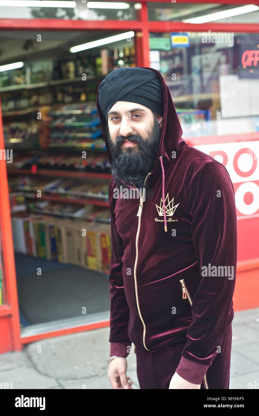 Asian shop keeper Stock Photo - Alamy
