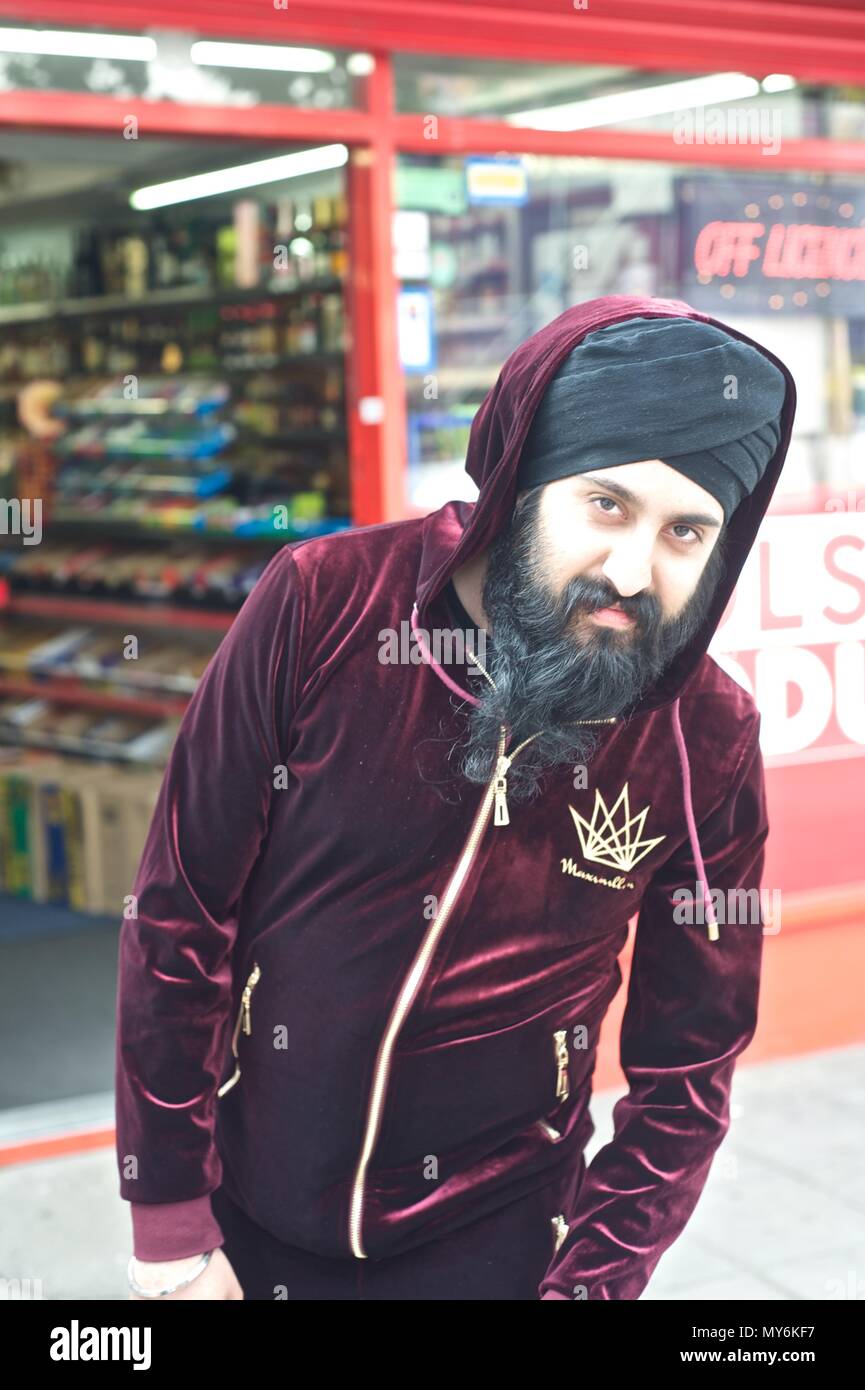 Asian shop keeper Stock Photo - Alamy