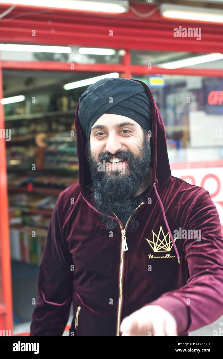 Asian shop keeper Stock Photo - Alamy