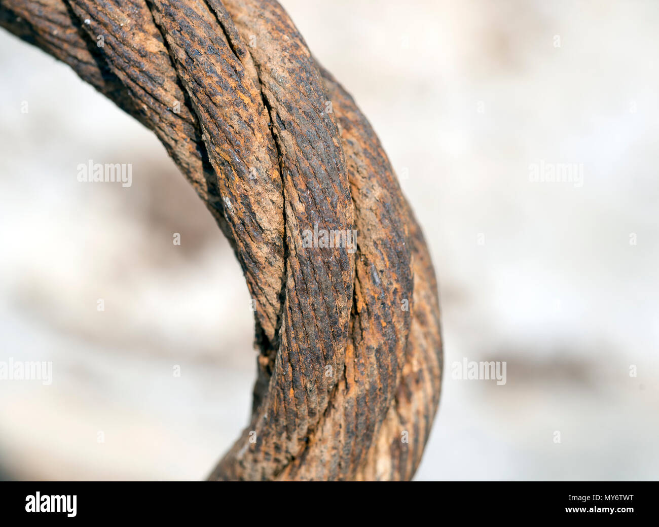 Twisted iron metal cable Stock Photo - Alamy