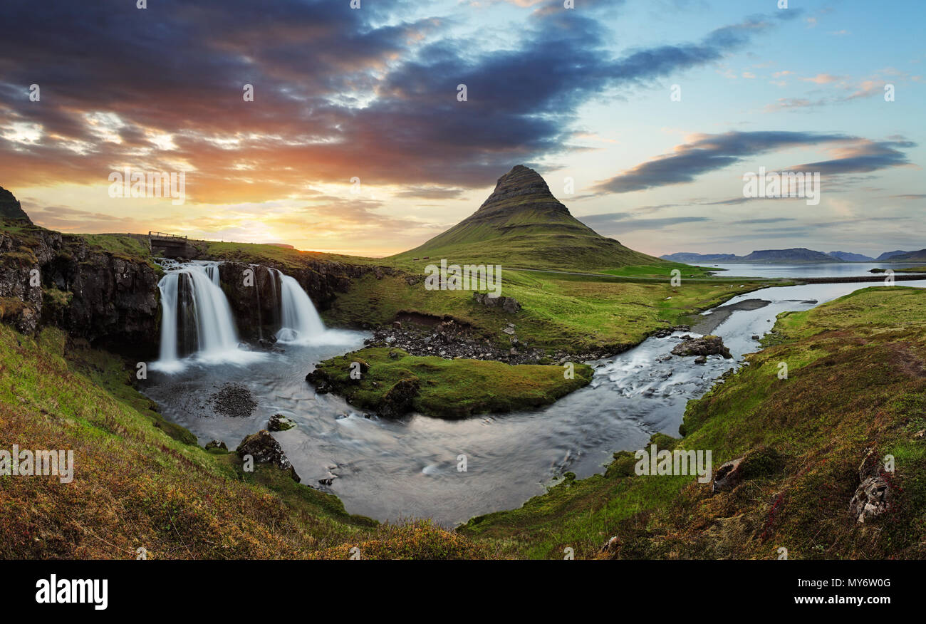 Iceland landscape with volcano and waterfall Stock Photo - Alamy