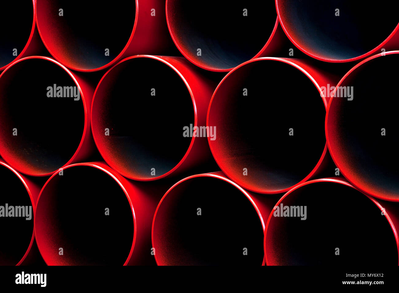 pattern of big red pipes Stock Photo - Alamy
