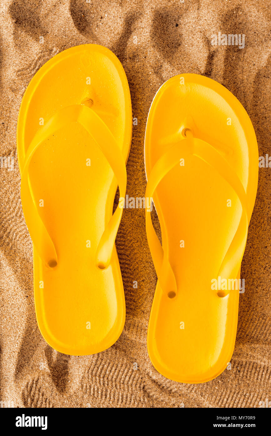 Beach flip flops sand hi-res stock photography and images - Alamy