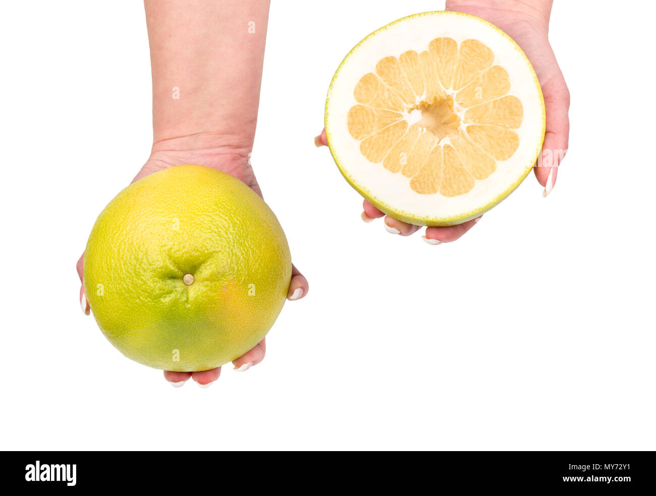 Full oroblanco fruit with half in hands on a white background Stock ...