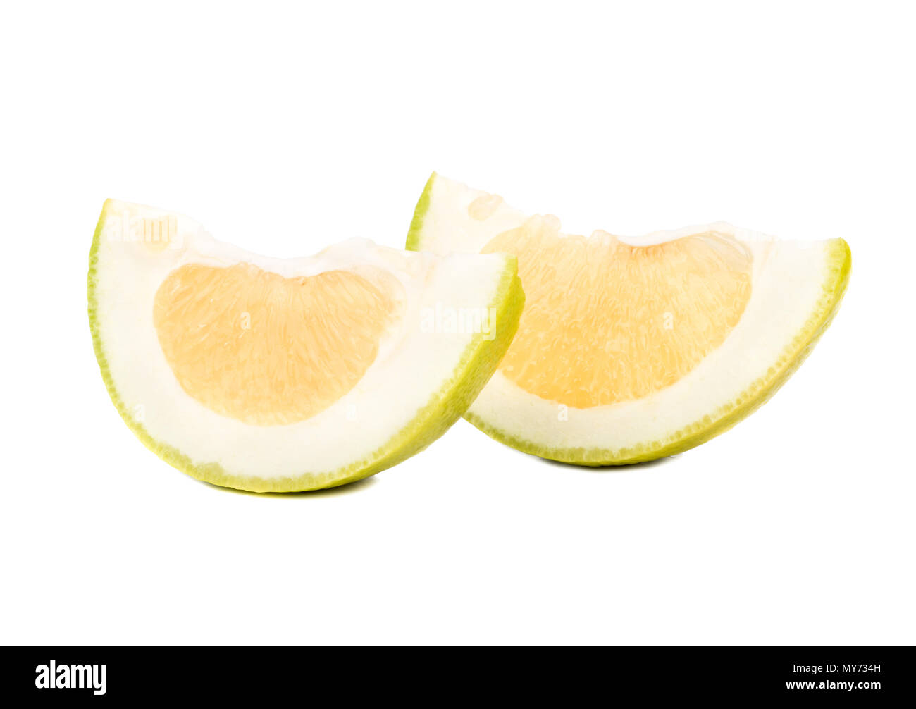 Two slices of fruit oroblanco on a white background Stock Photo - Alamy