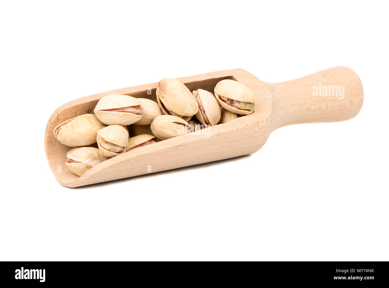Salted pistachio nuts in a scoop on a white background Stock Photo - Alamy
