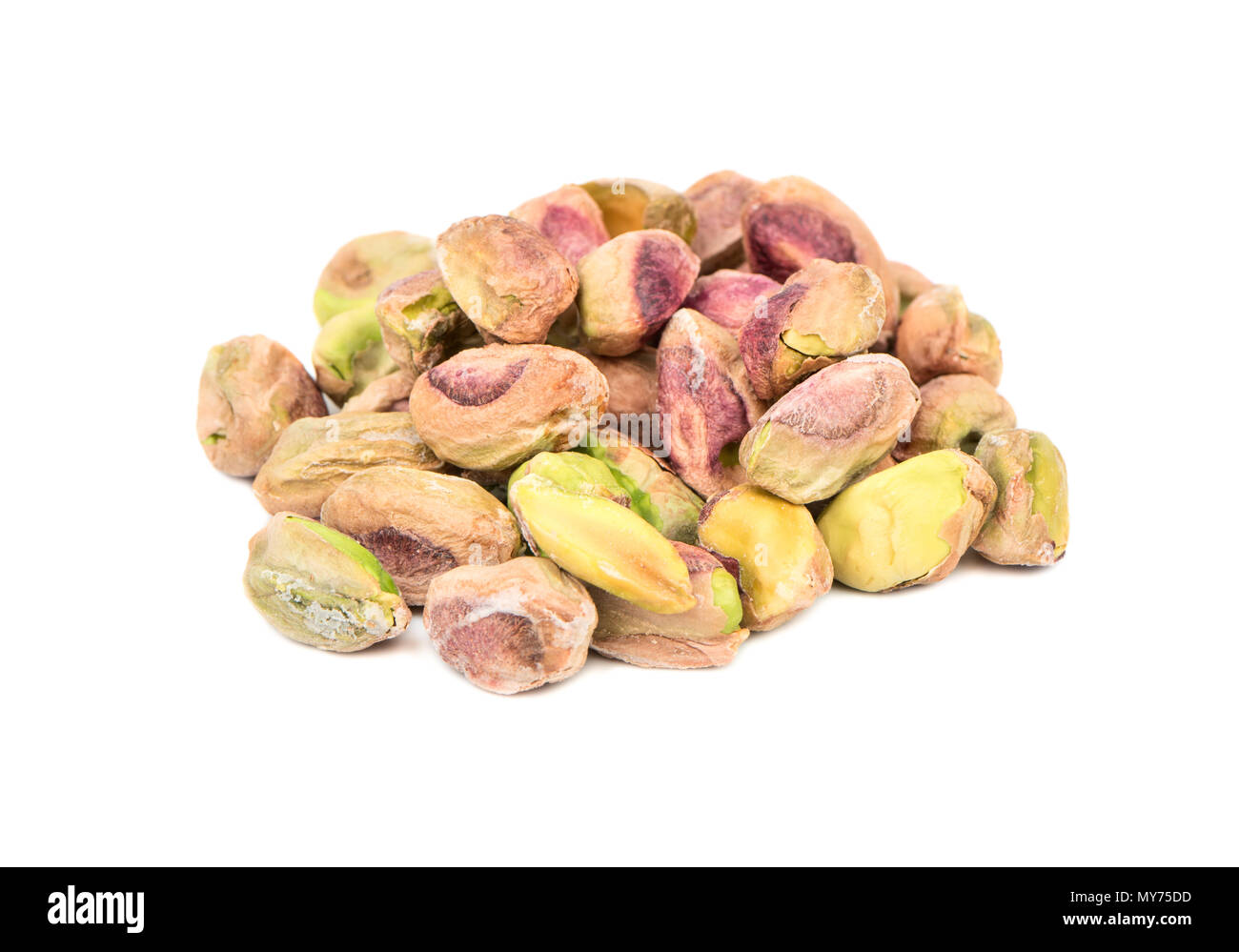 Pile of pistachio nuts without shell on a white background Stock Photo ...