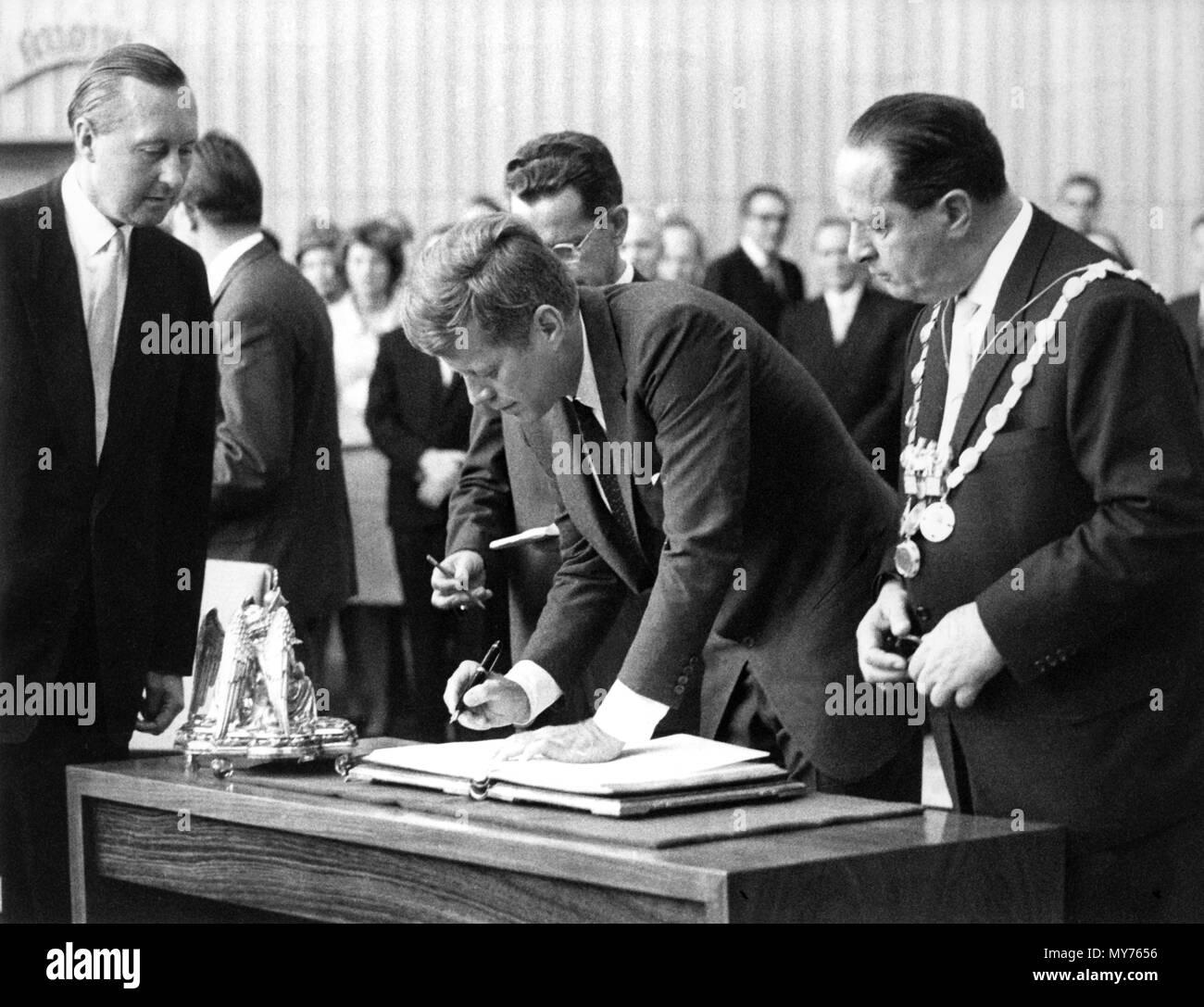 John F. Kennedy signing the Golden Book of the city of Cologne on 23 ...