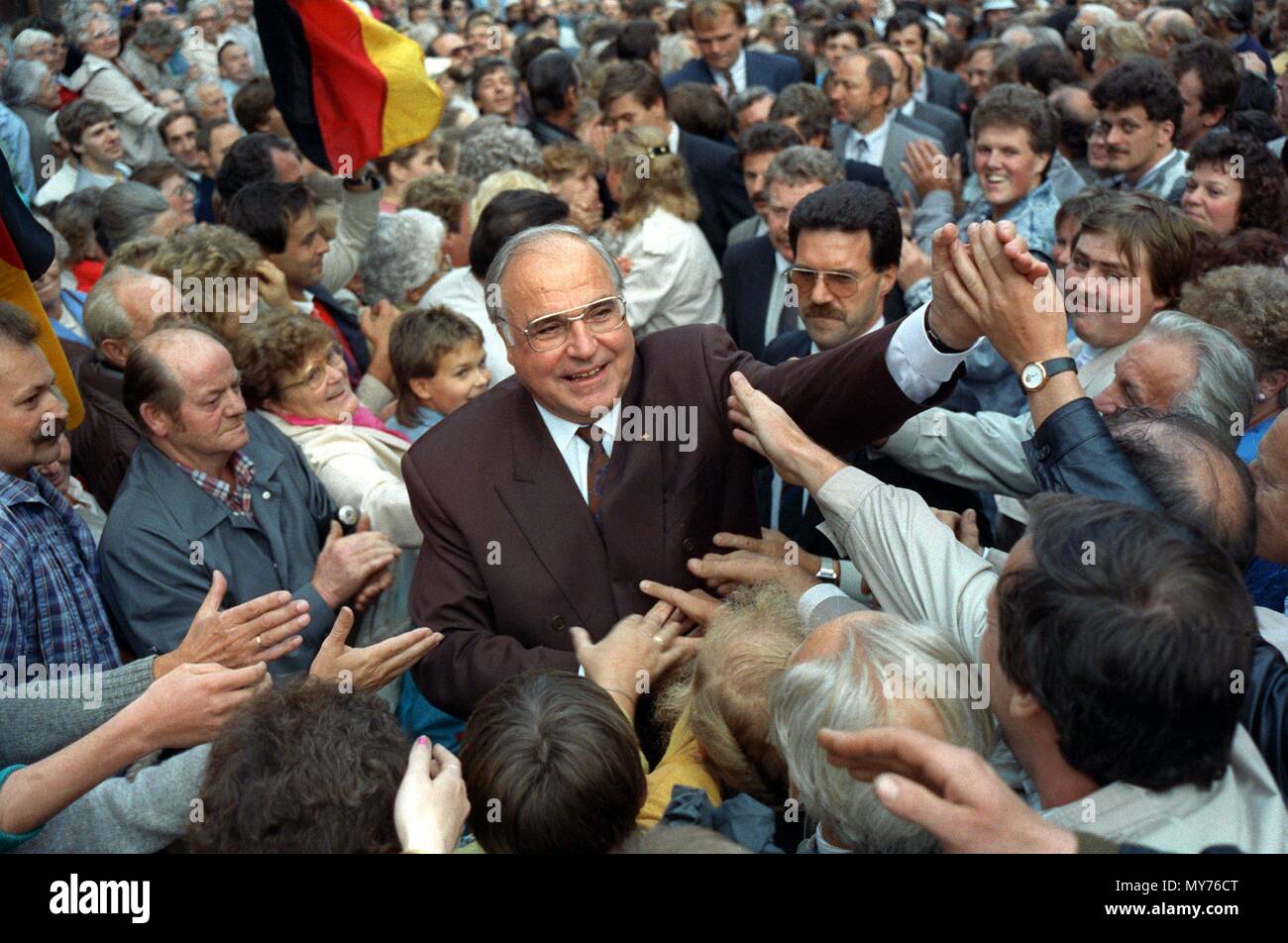 German Chancellor Helmut Kohl surrounded by a crowd during an election ...