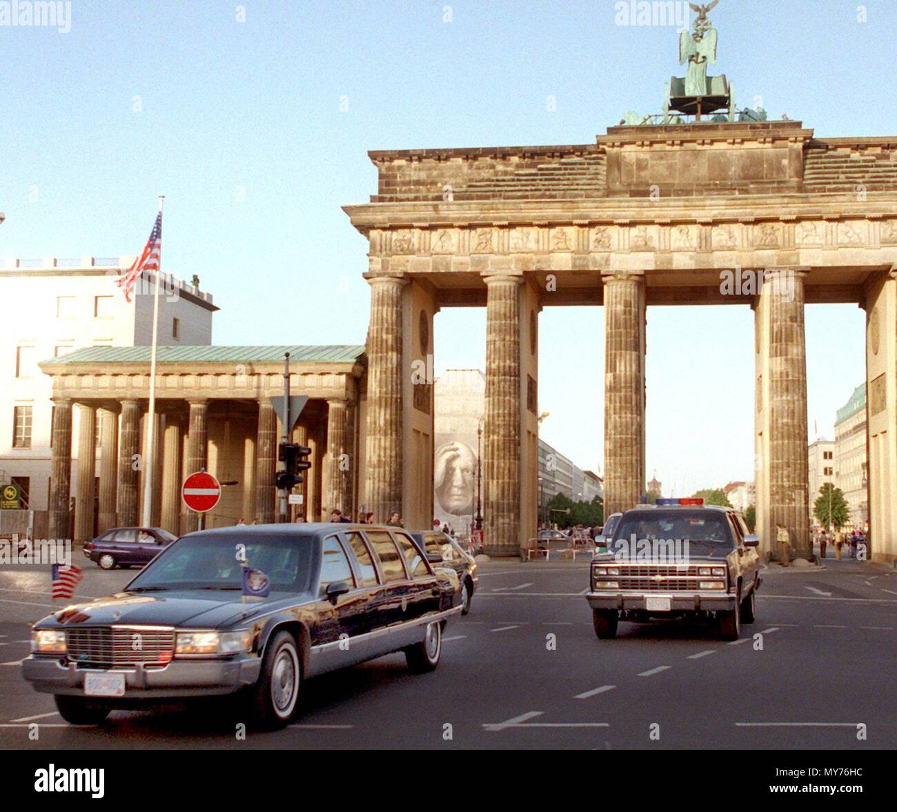 US President Bill Clinton passes through the Brandenburg Gate in his ...