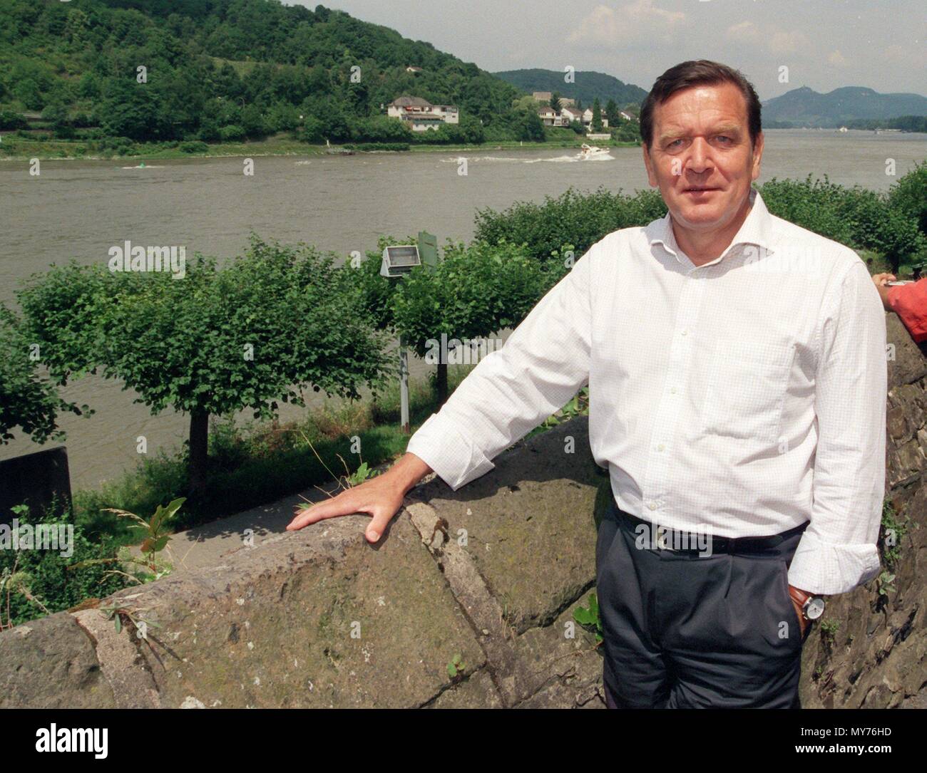 German Chancellor Gerhard Schroeder standing by the river Rhine near ...