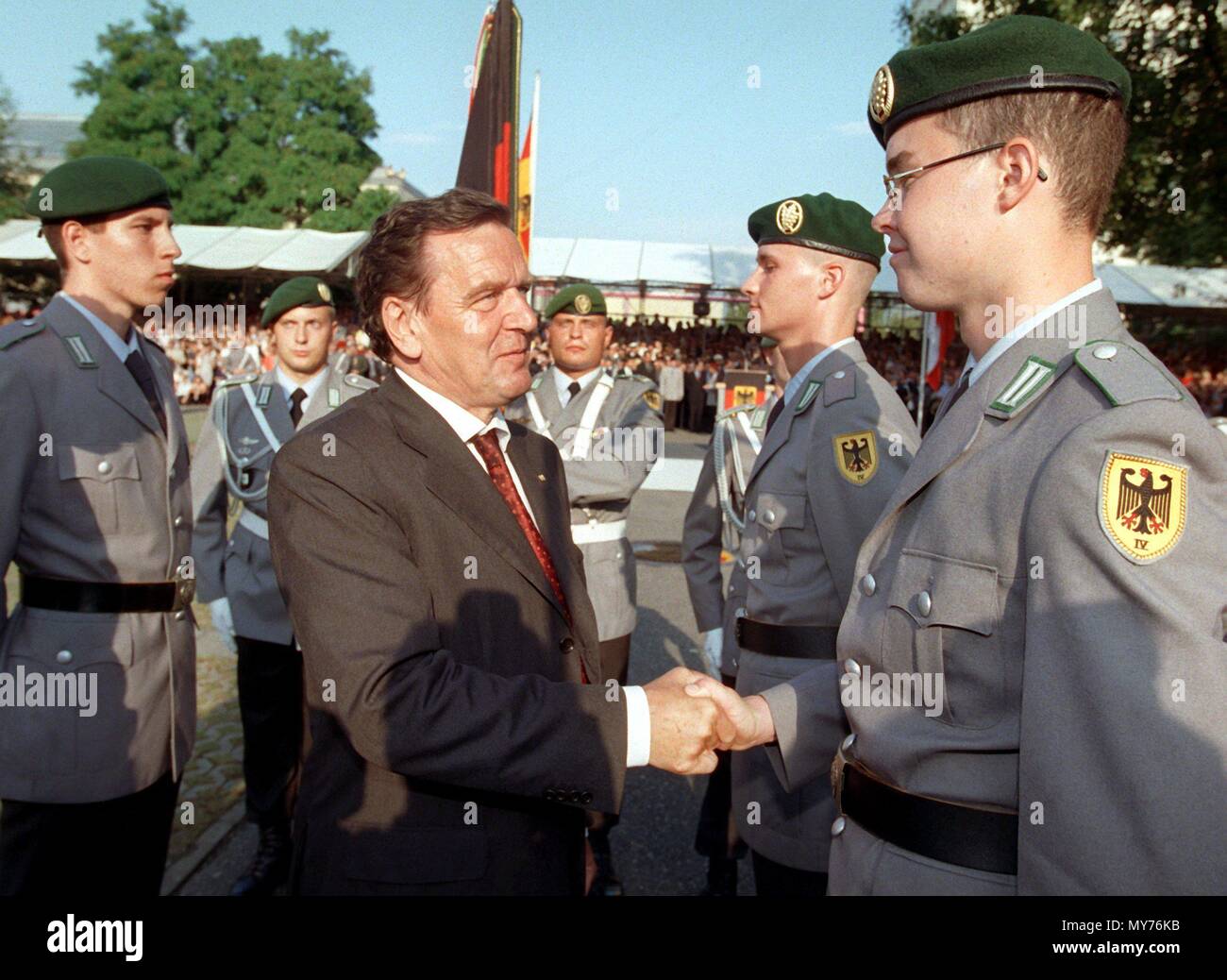 German Chancellor Gerhard Schroeder congratulates young Bundeswehr ...