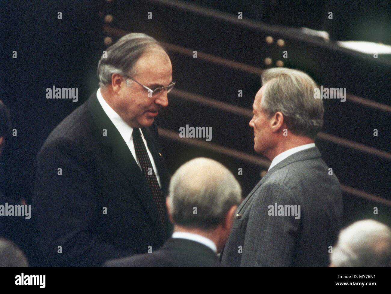 SPD leader Willy Brandt (r) congratulates the new chancellor after his ...