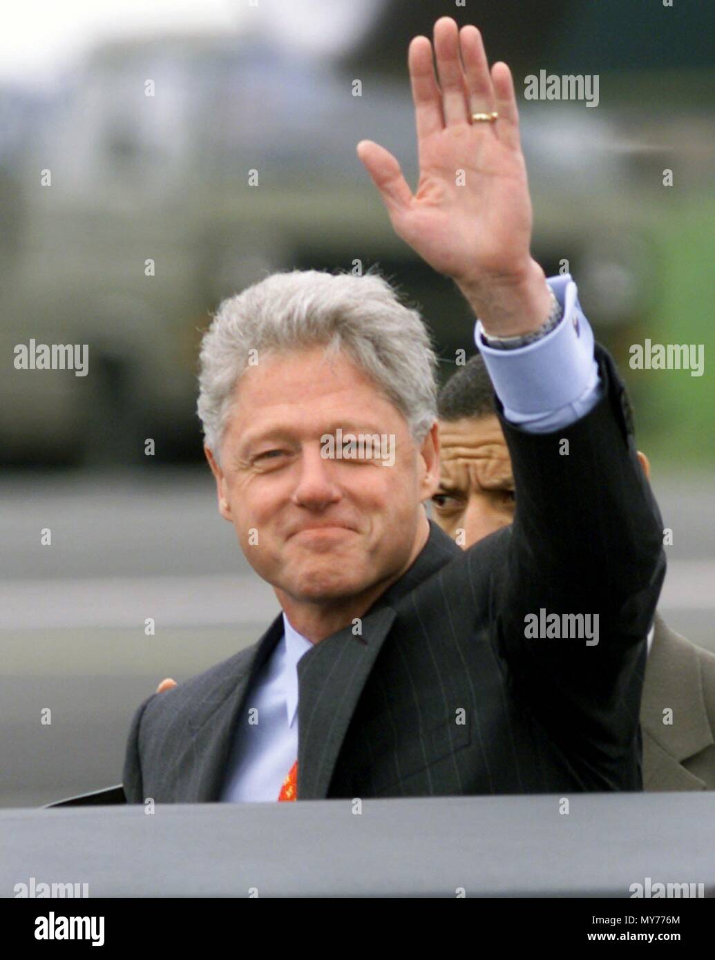 US President Bill Clinton greets waiting soldiers after landing at US ...