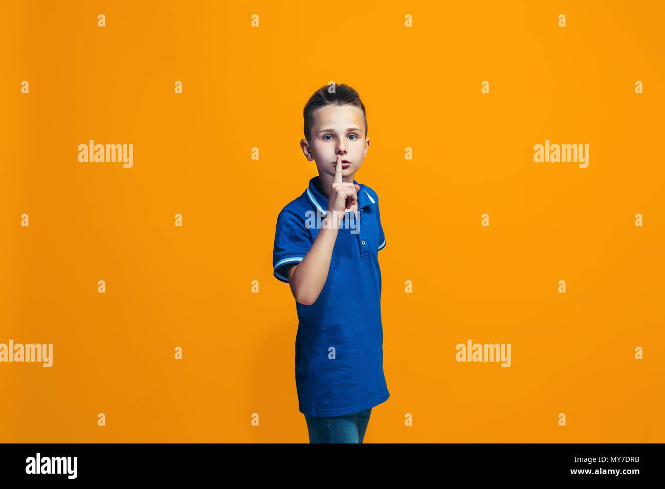Young serious thoughtful teen boy. Doubt concept Stock Photo - Alamy