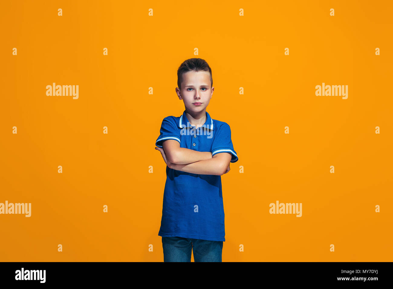 Young serious thoughtful teen boy. Doubt concept Stock Photo - Alamy