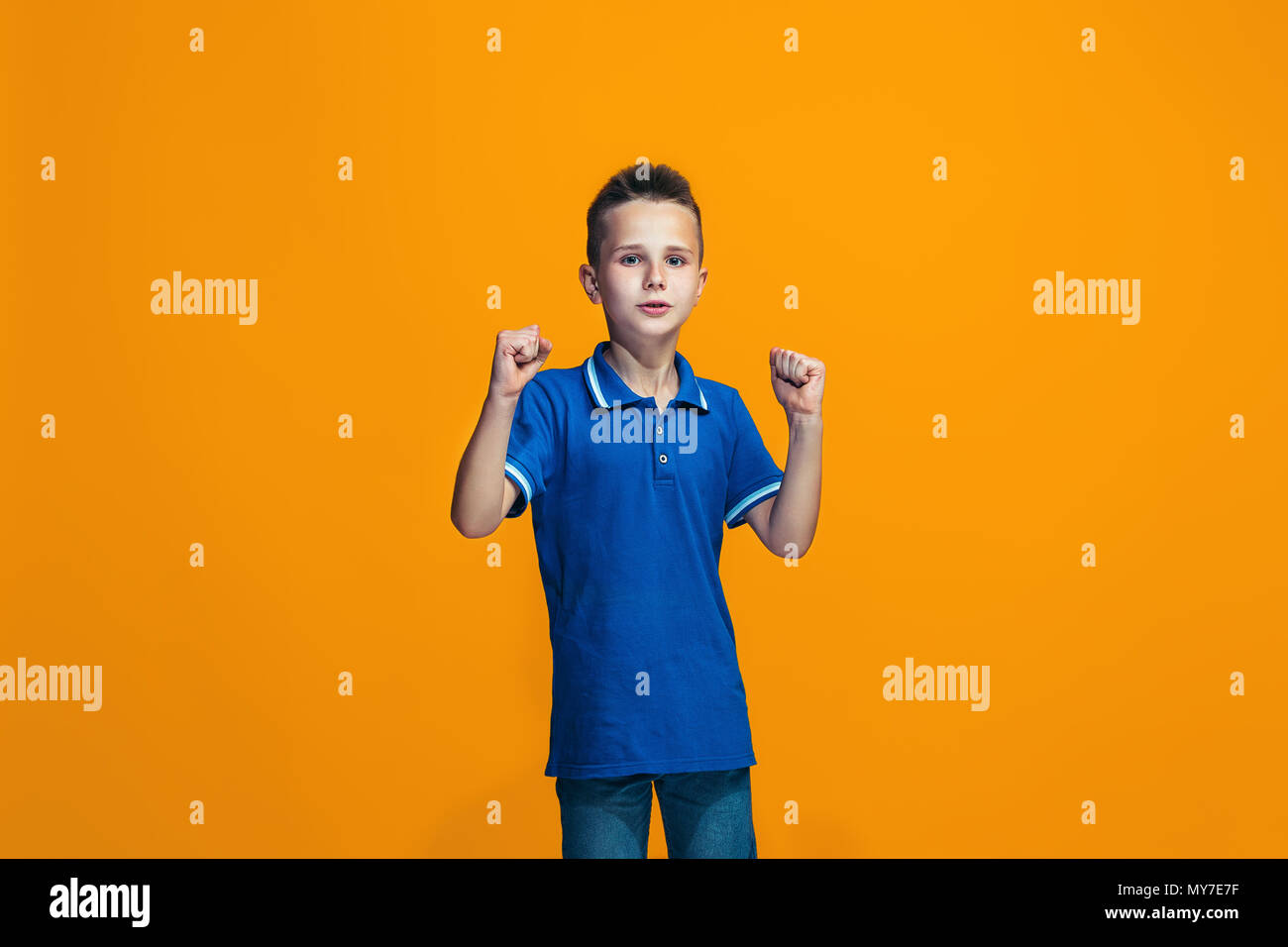 Happy success teen boy celebrating being a winner. Dynamic energetic ...
