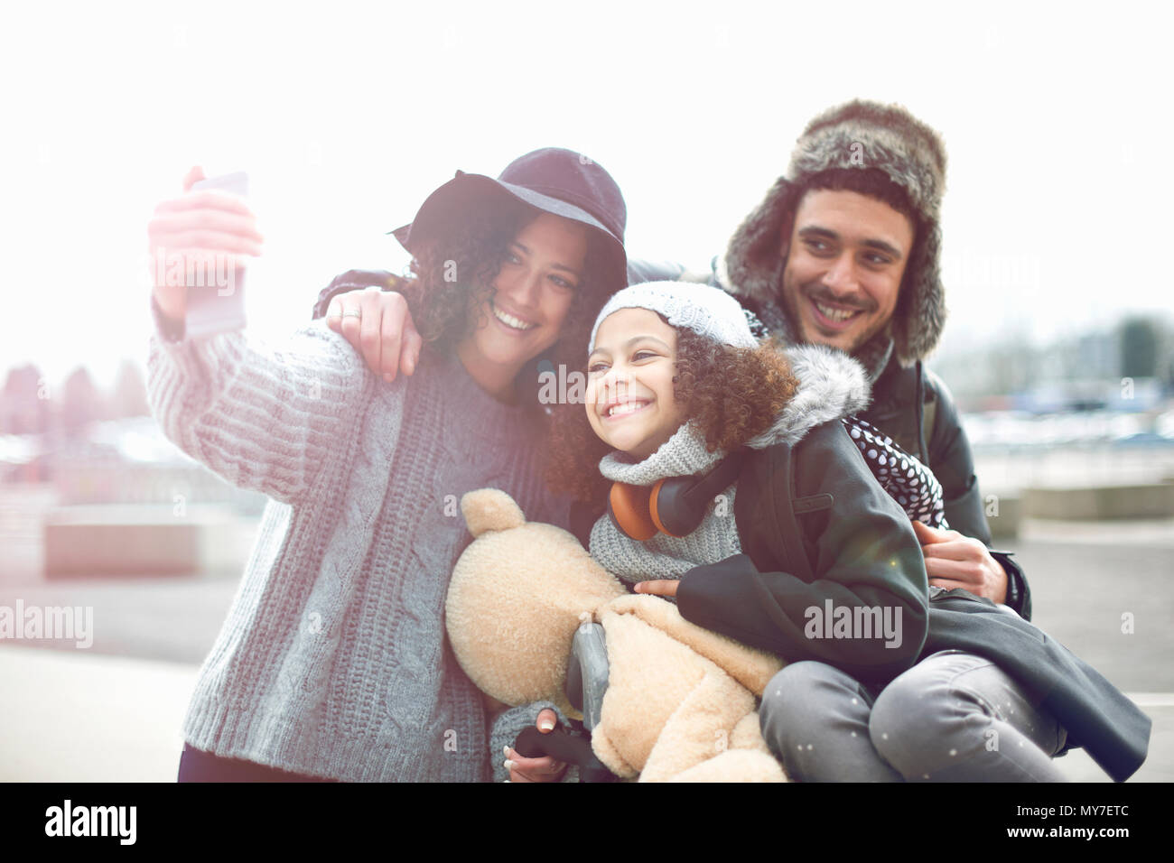 Family taking selfie, smiling Stock Photo - Alamy Family taking selfie, smiling Stock Photo - Alamy