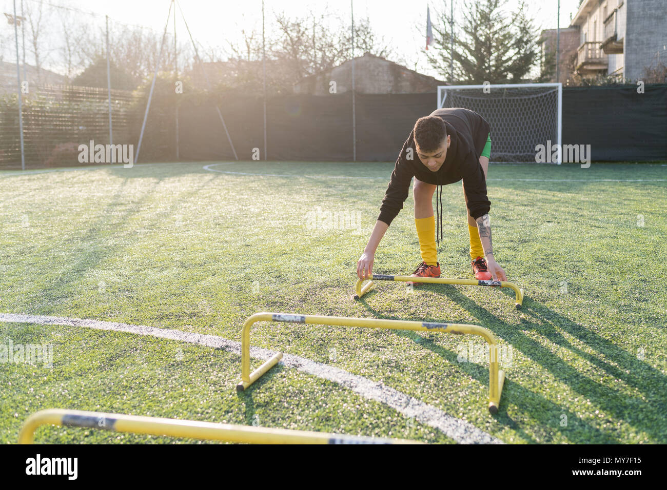 Bending football hi-res stock photography and images - Alamy