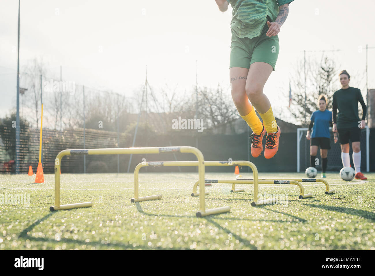 Football player jumping hi-res stock photography and images - Alamy