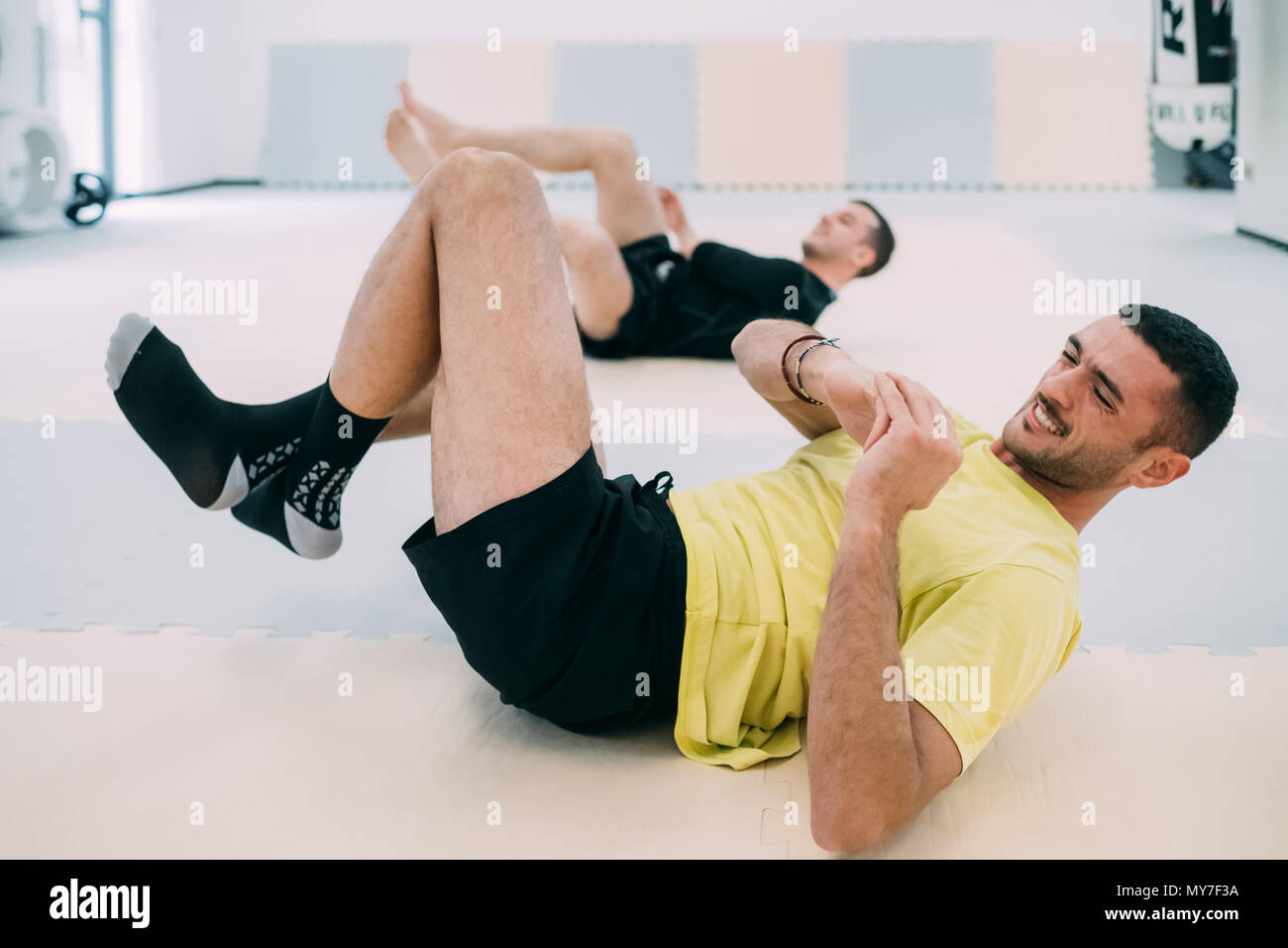 Young male doing sit ups hi-res stock photography and images - Alamy