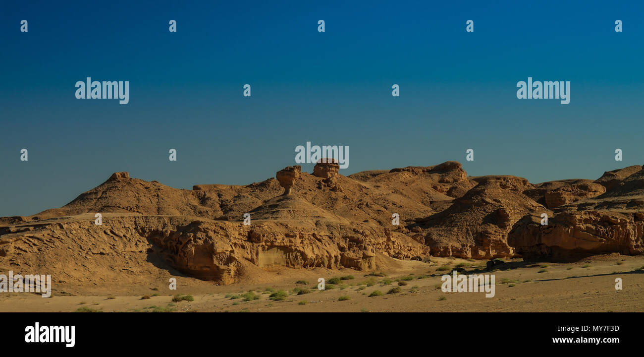 Buttes at the dried shore of Razazza lake aka Milh lake or Sea of Salt ...