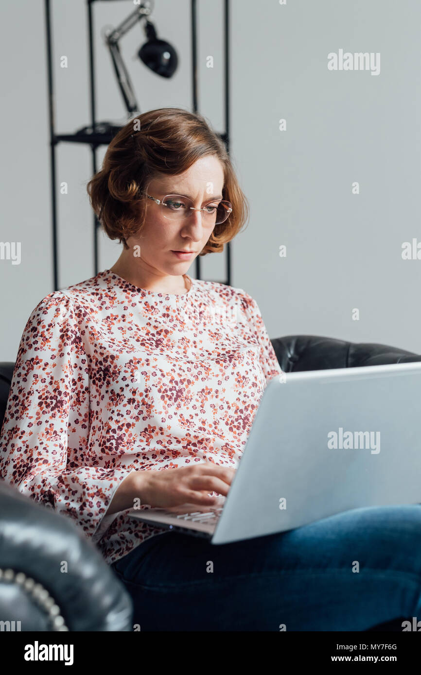 Person laptop on lap hi-res stock photography and images - Alamy