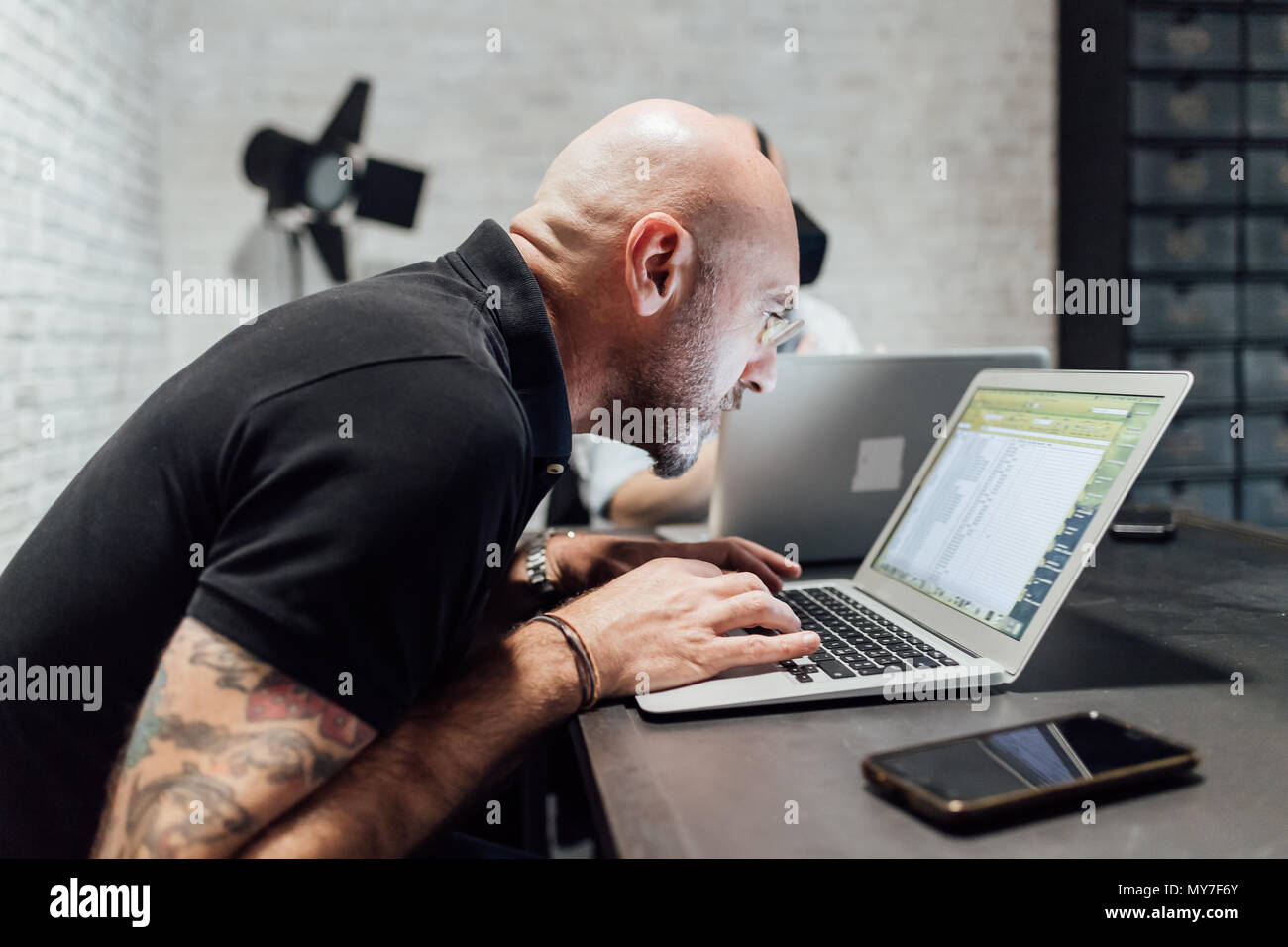 Peering man hi-res stock photography and images - Alamy