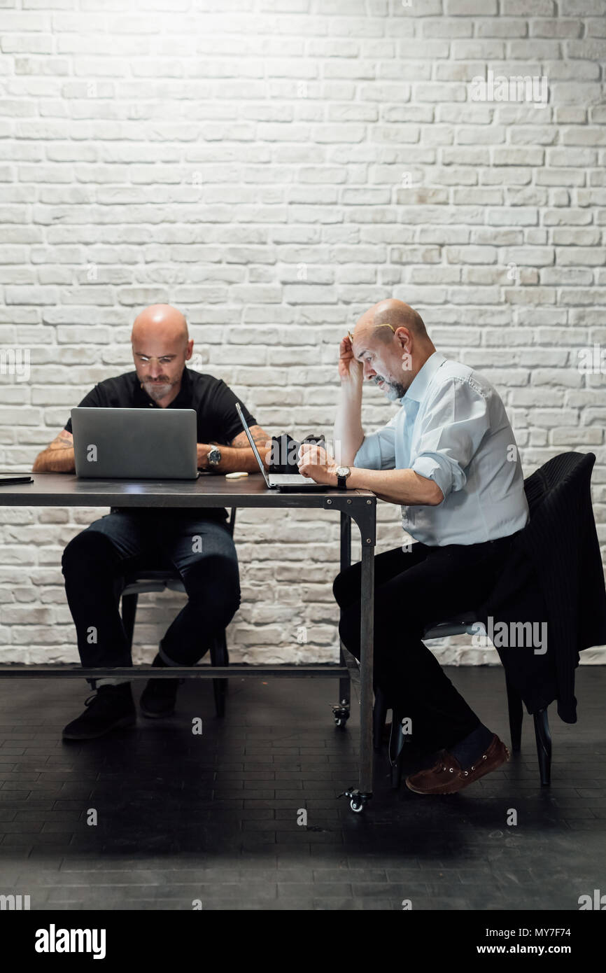 Two colleagues desk white background hi-res stock photography and ...
