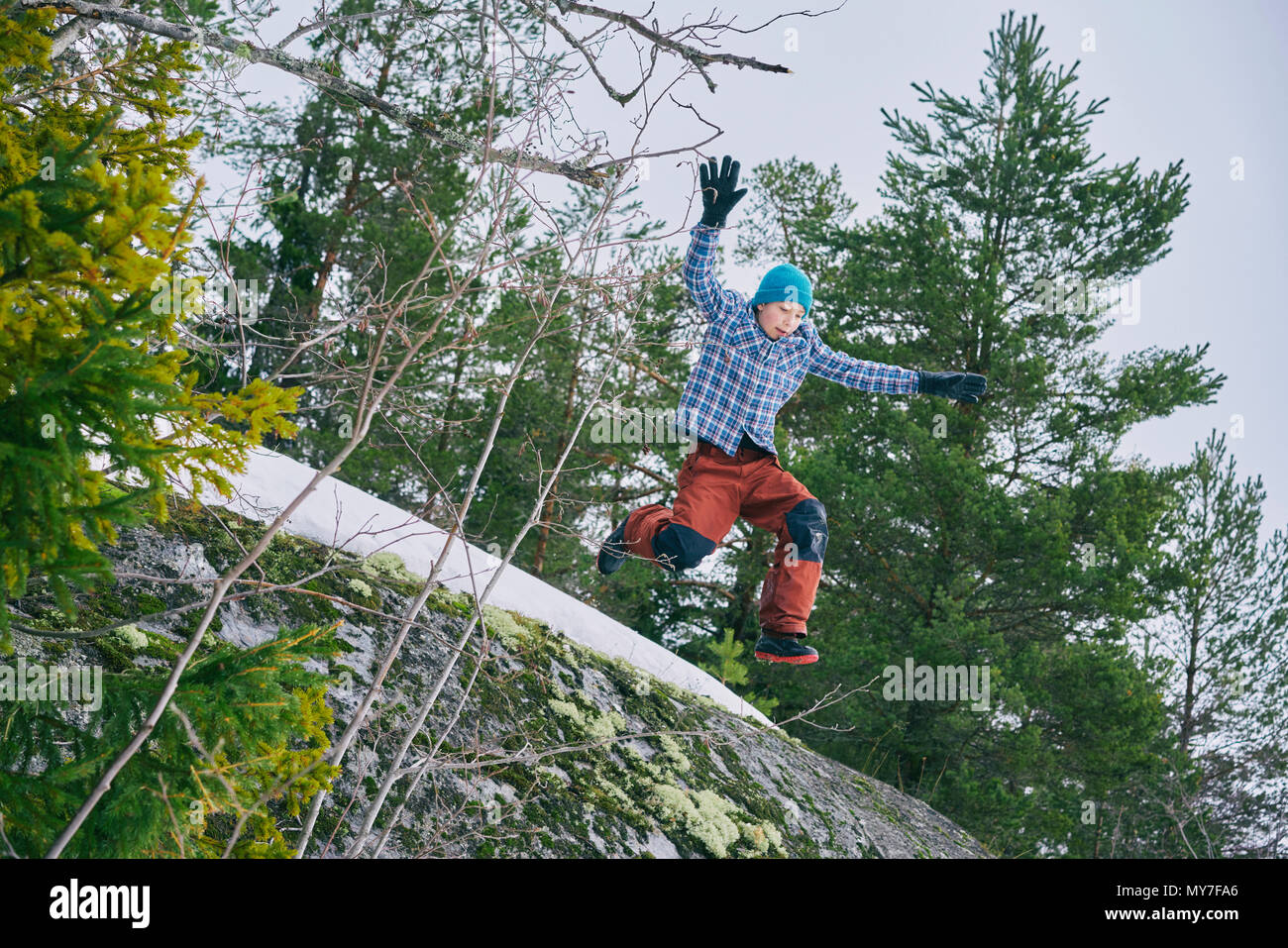 Boy jumping hi-res stock photography and images - Alamy