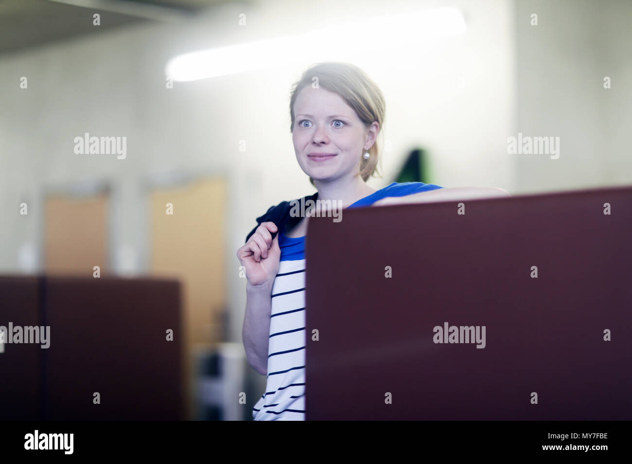 Woman carrying computer monitor hi-res stock photography and images - Alamy