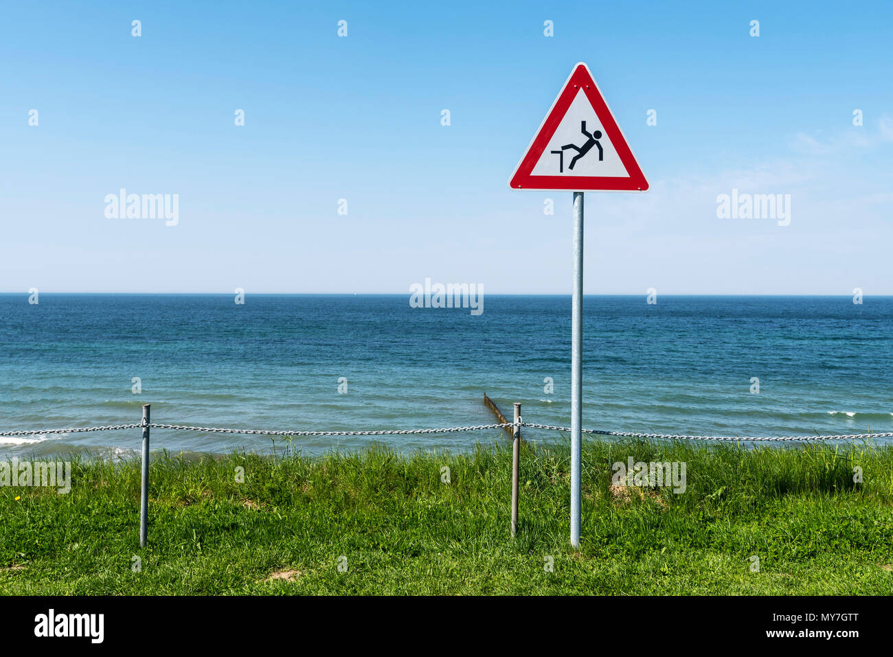 Warning Danger of falling, sign at steep coast near Nienhagen, Baltic ...