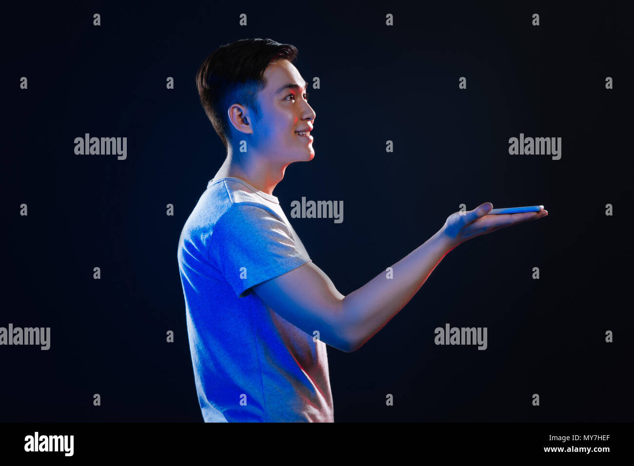 Positive Asian man smiling Stock Photo - Alamy