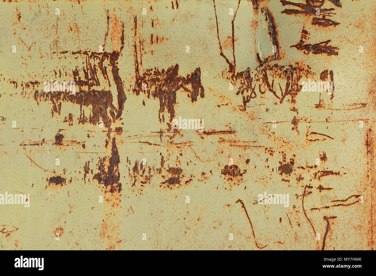 old wall with rusty spots and old inscriptions. abstract background ...