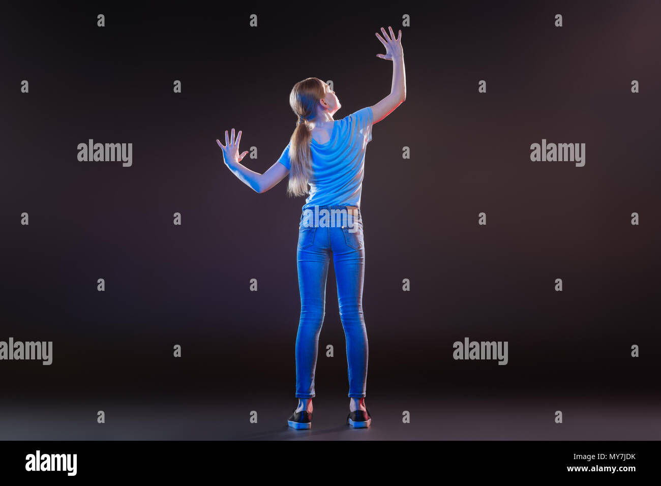 Full length model turning back hi-res stock photography and images - Alamy