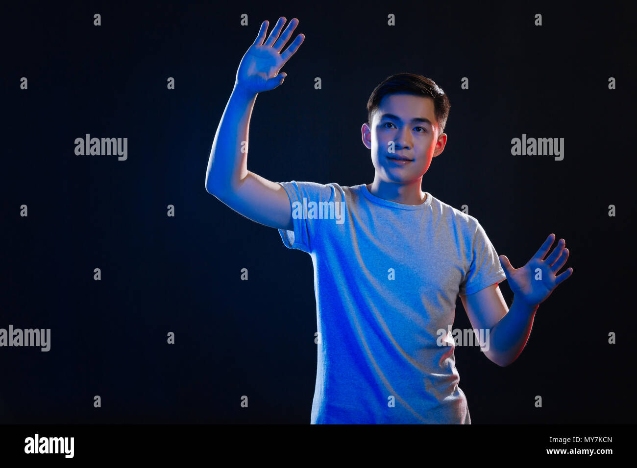 Positive joyful man smiling Stock Photo - Alamy