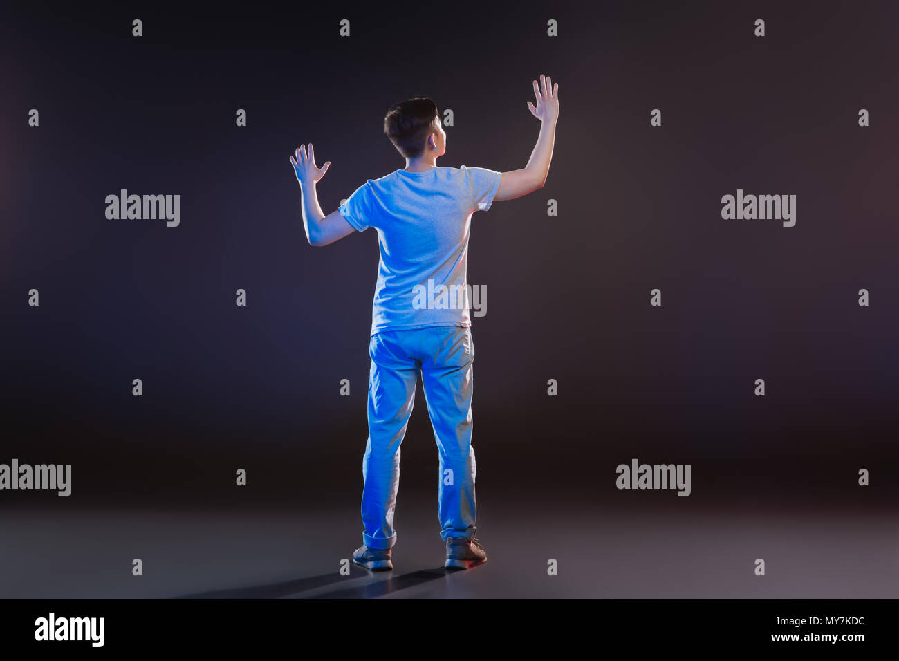 Delighted nice man looking in front of him Stock Photo - Alamy